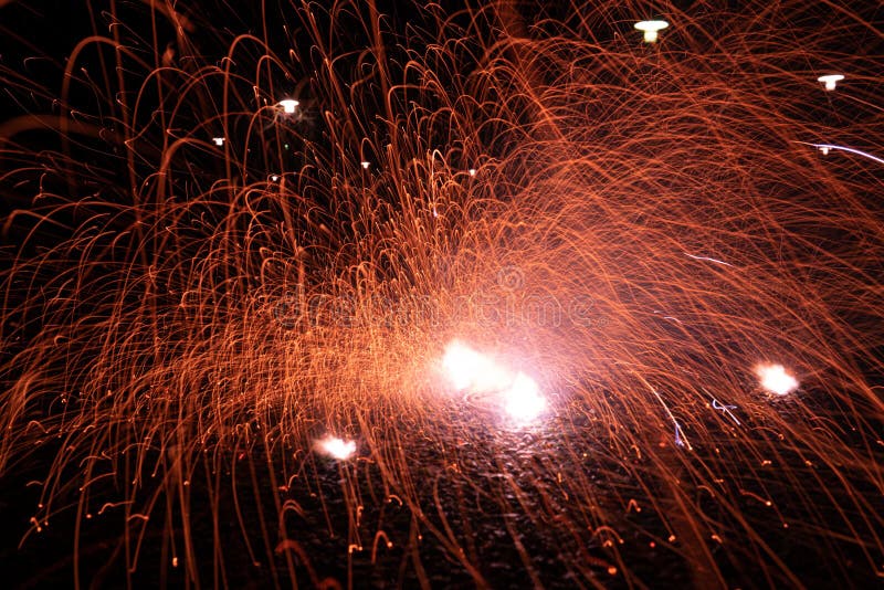 Yellow Ground Fireworks on Asphalt Exploding.. Stock Photo - Image of ...
