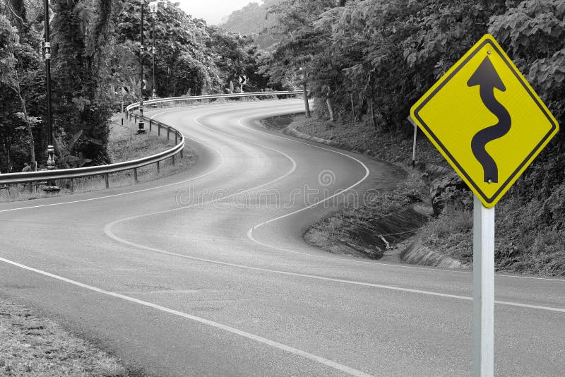 Yellow Guidepost on Asphalt Road Stock Photo - Image of destination ...