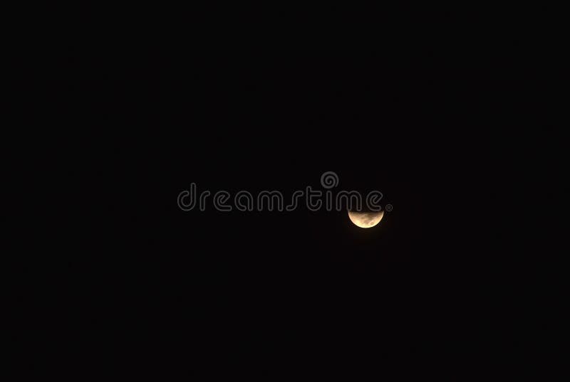 Yellow Half Moon Covering by Cloud Arranging on Sky in Night Stock ...