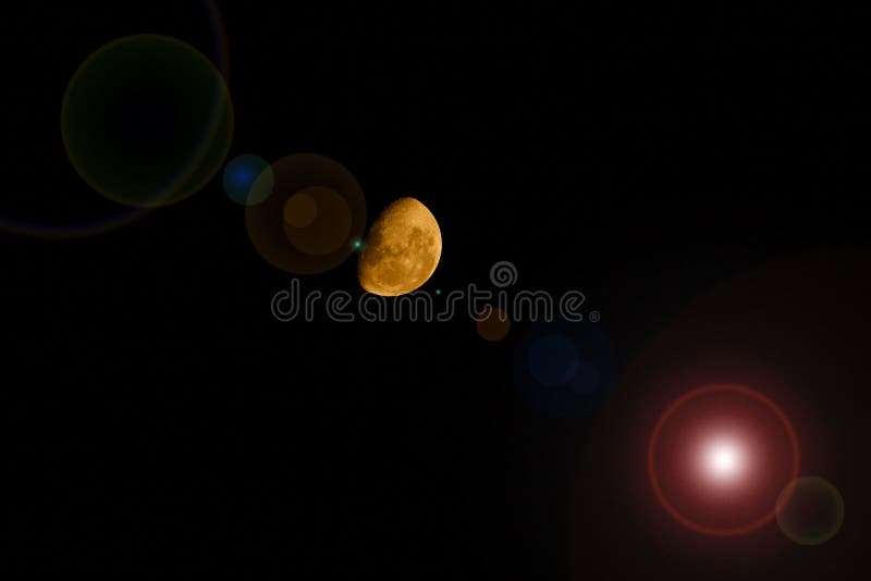 Yellow Half Moon Lens Flare Stock Photo - Image of black, dark: 8438220