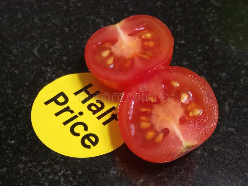 Half sliced tomatoes stock image. Image of yellow, sticker - 106839761