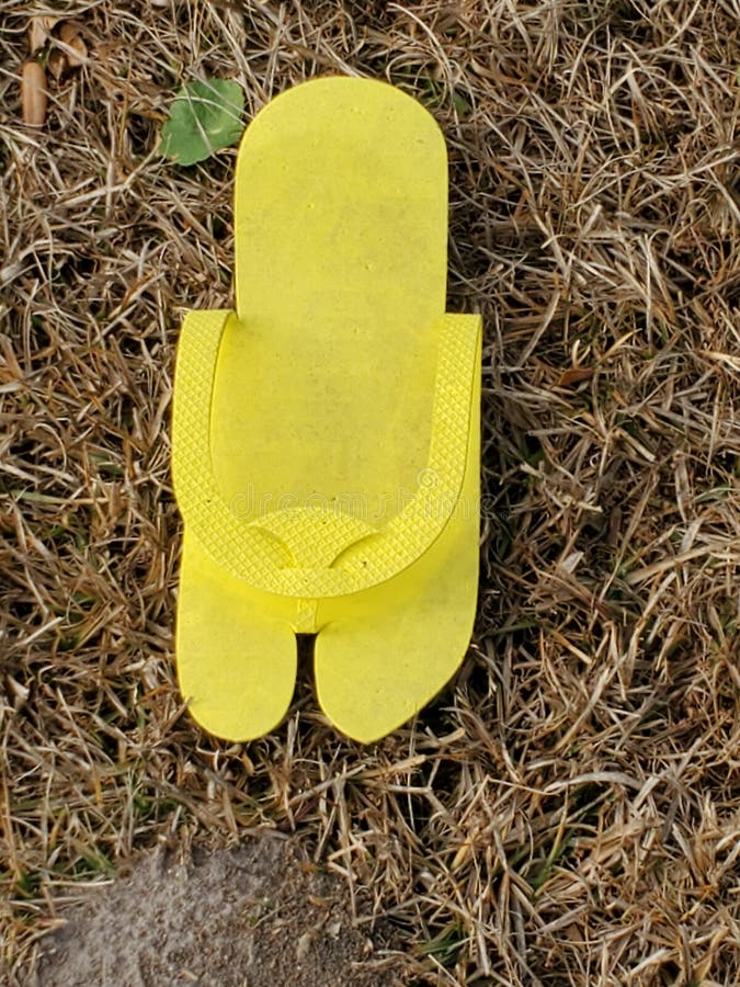 Yellow Hand Made Flip-flop Diwhy Stock Image - Image of crop, lawn ...
