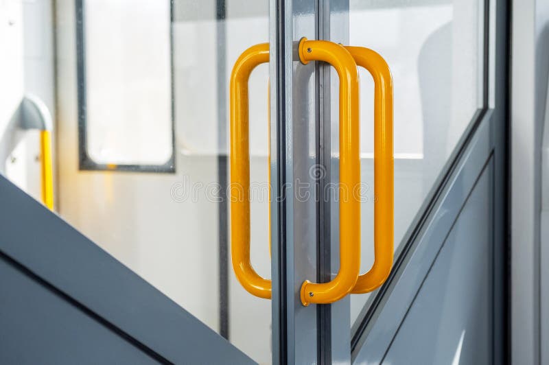 Yellow Handrails on Modern Train Doors for Safety, Commuter ...