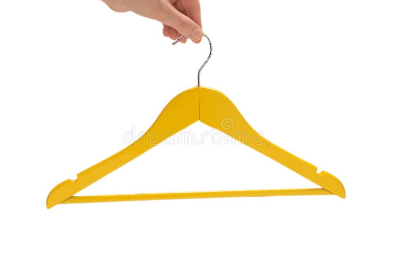 Yellow Hanger in Woman Hand Isolated on White Stock Photo - Image of ...