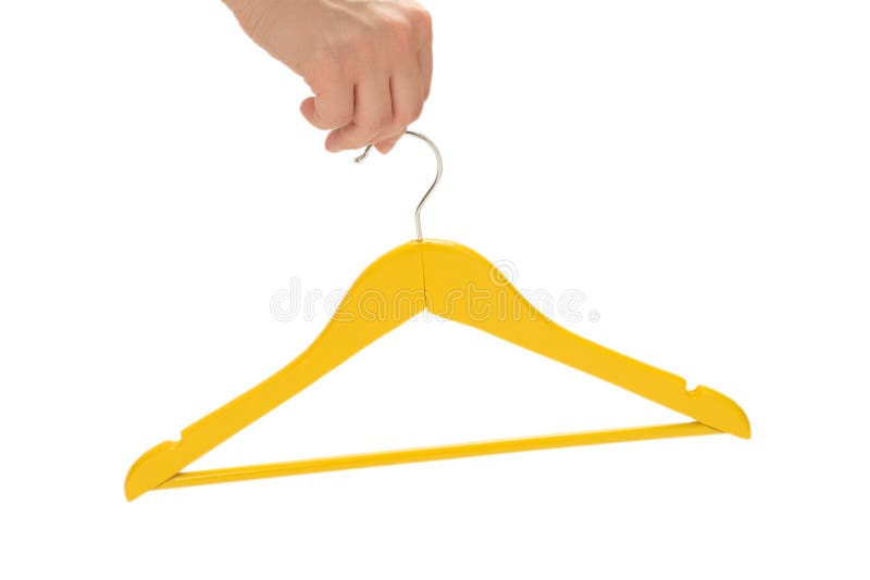 Yellow Hanger in Woman Hand Isolated on White Stock Photo - Image of ...