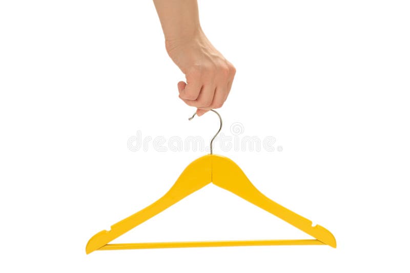 Yellow Hanger in Woman Hand Isolated on White Stock Photo - Image of ...