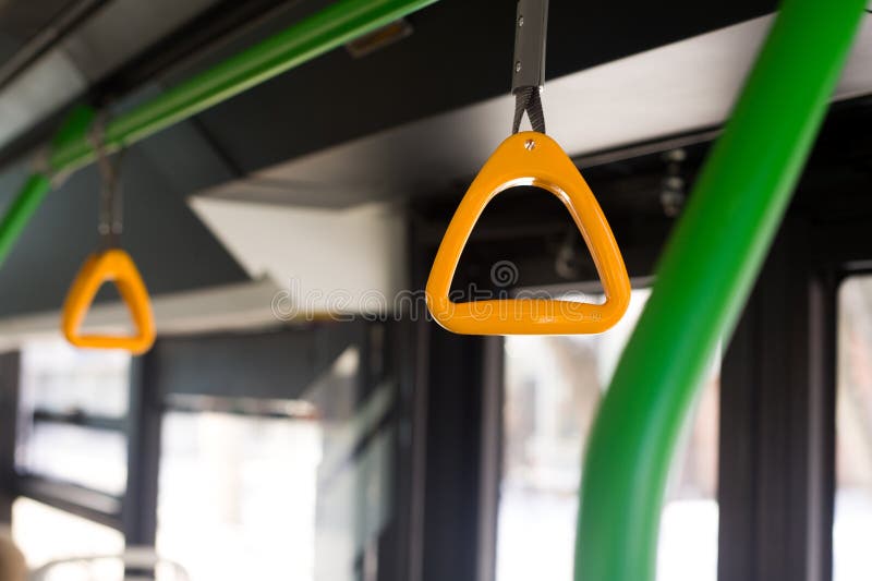 Hanging holder in the bus stock photo. Image of handgrip - 302436702