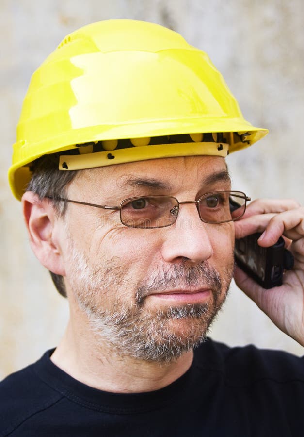 Yellow hard hat stock photo. Image of yellow, gaze, speaking - 7109766