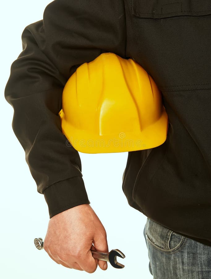Yellow Hard Hat and Spanner in Hand Working Man Stock Photo - Image of ...