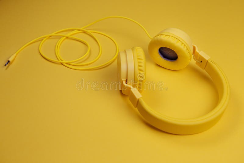 Yellow Headphones on Yellow Background. Music Concept. Stock Image ...