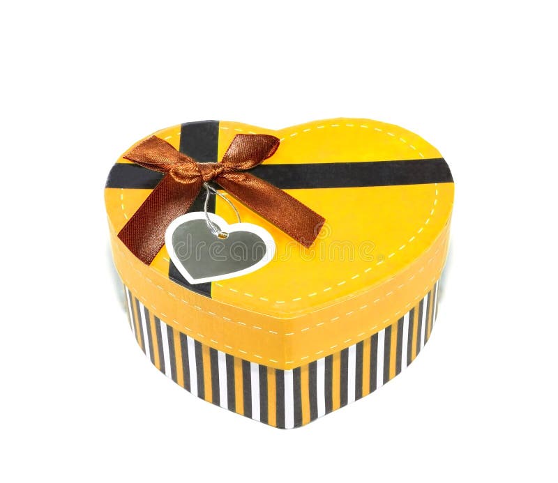 Yellow Heart-shaped box stock photo. Image of present - 35180034
