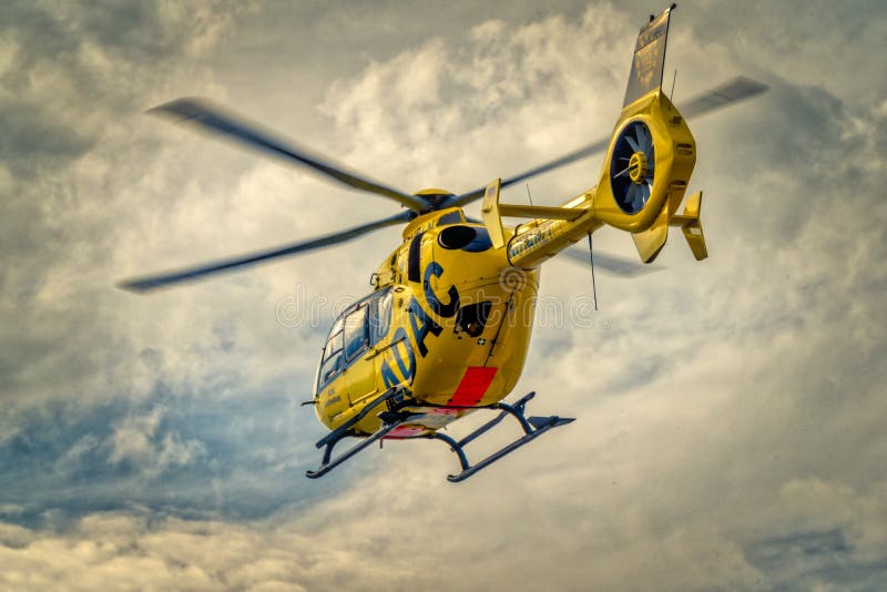 Yellow Helicopter stock photo. Image of transport, wind - 83064484