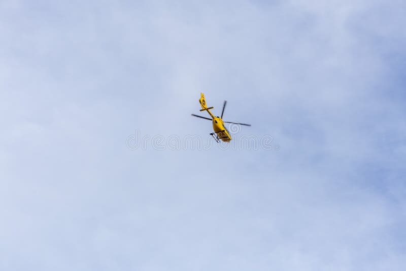 Yellow Helicopter Flying in the Blue Sky Stock Image - Image of wings ...