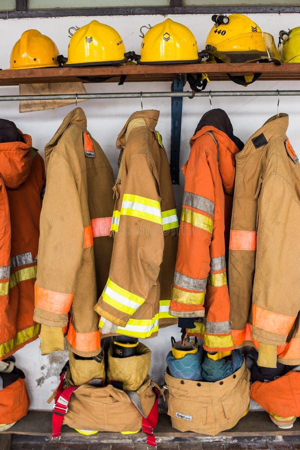 Yellow Helmet and Jacket of Fire Fighter Stock Image - Image of ...