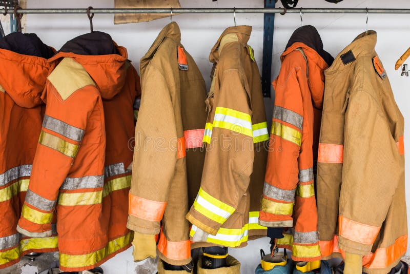 Yellow Helmet and Jacket of Fire Fighter Stock Image - Image of closeup ...