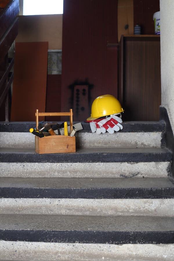 Yellow helmet and toolbox stock image. Image of instruments - 257113381