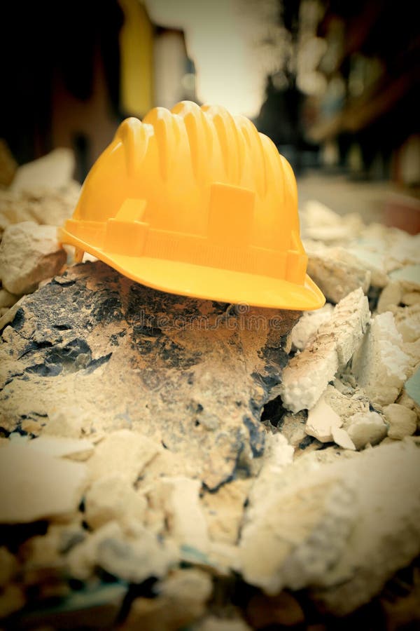 Yellow Helmet on a Work Site Stock Image - Image of head, helmet: 309606021