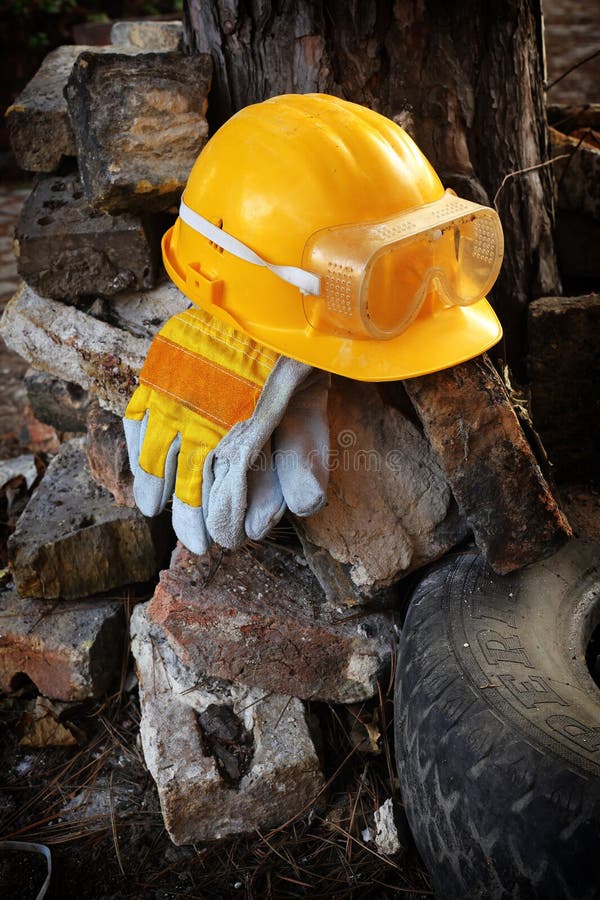 Yellow Helmet on a Work Site Stock Photo - Image of protect, safe ...
