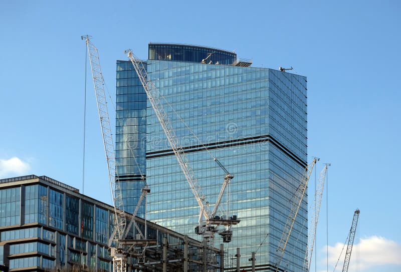Yellow Hoisting Tower Crane in Construction Process of Constructing ...