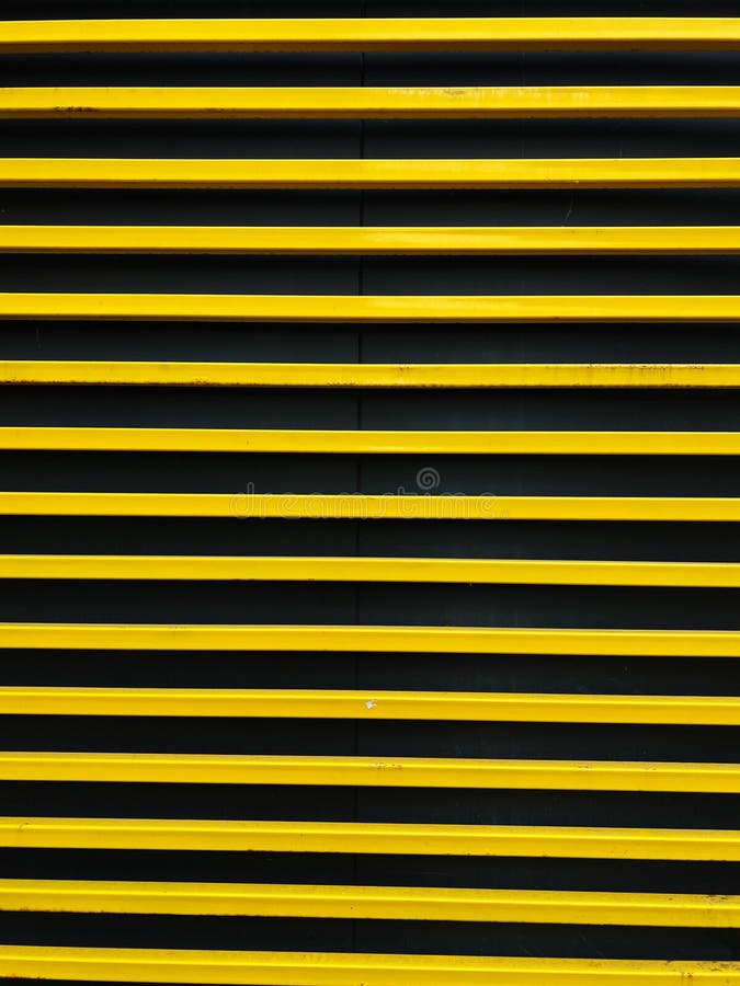 Yellow Horizontal Bars on a Dark Background Creating a Striking Pattern ...