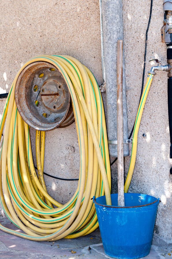 Yellow hose stock photo. Image of plastic, coiled, irrigation - 39359096