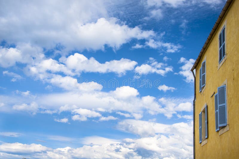 Yellow House with Blue Windows. Stock Image - Image of design, freedom ...