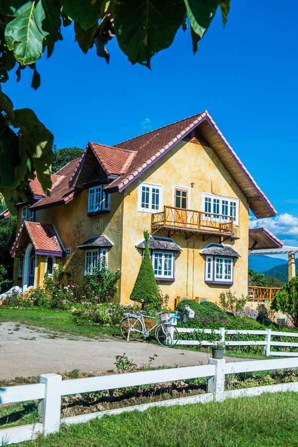 Yellow house at Pai city stock photo. Image of mansion - 172857320