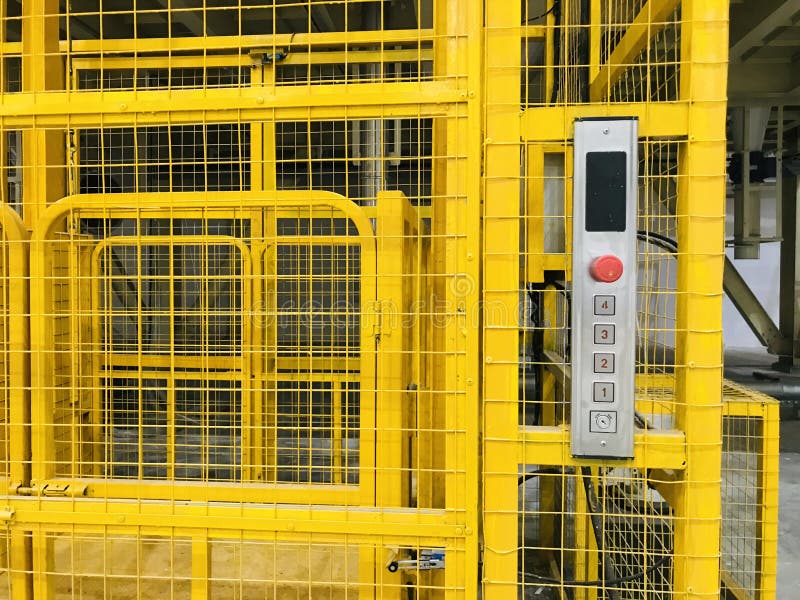 Yellow hydraulic lift stock image. Image of factory - 158715813