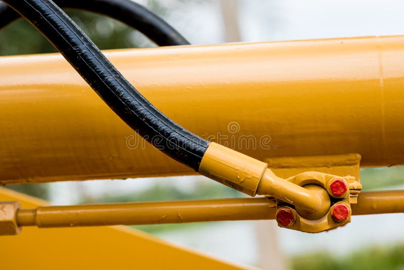 Yellow hydraulic pipe stock image. Image of technology - 55930451