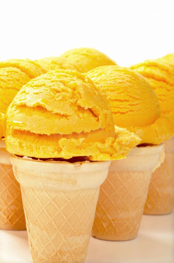 Yellow ice cream cones stock image. Image of studio, sorbet - 55919443