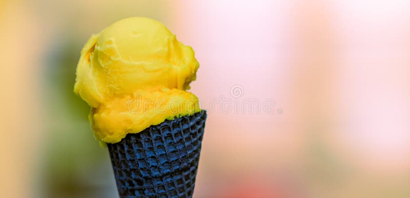 Yellow Ice Cream in a Wafer Chocolate Cone Stock Image - Image of cold ...