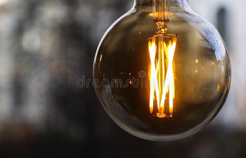 The Yellow Incandescent Bulb Stock Image - Image of bulb, bright: 263086019