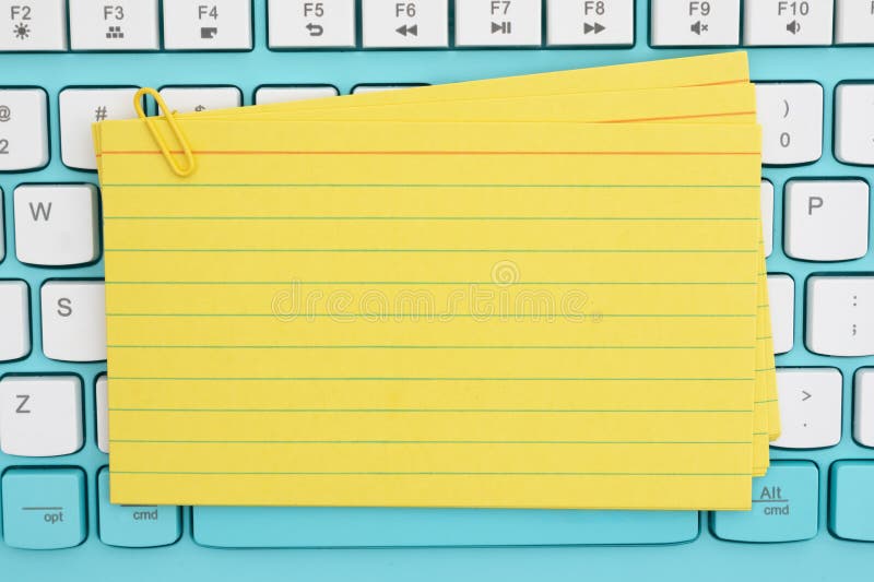 Yellow Index Cards with Paperclip Placed on Computer Keyboard Stock ...