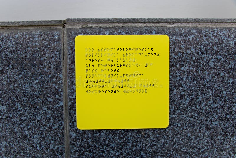 Yellow Information Plate with Braille Sign for Blind on Wall Stock ...