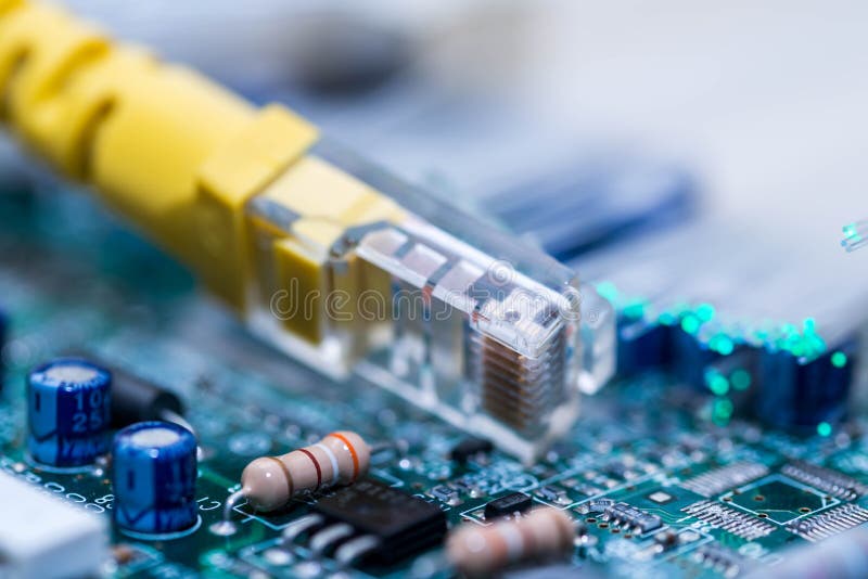 Yellow Internet Switch on Computer Circuit Board, Glowing Optical ...