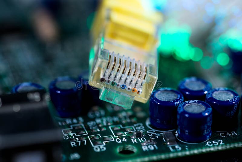 Yellow Internet Switch on Computer Circuit Board , Glowing Optical ...