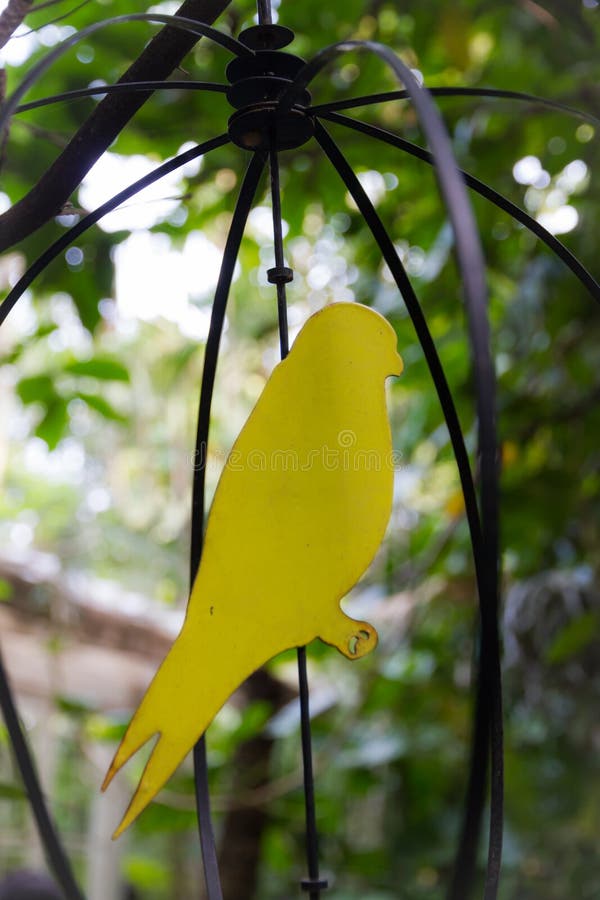 Iron bird holding the lamp stock photo. Image of iron - 119405558