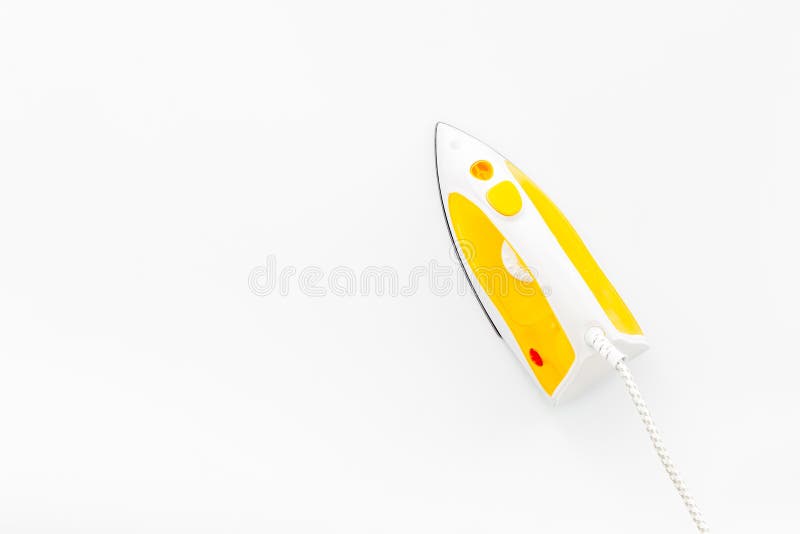 Yellow Iron on Ironing Board. Top View, Copy Space Stock Photo - Image ...