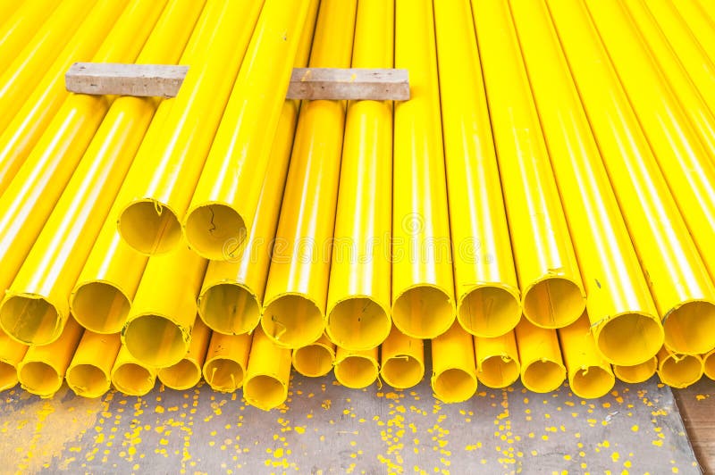 Yellow iron pipe stock photo. Image of round, shiny, cylinder - 35421390