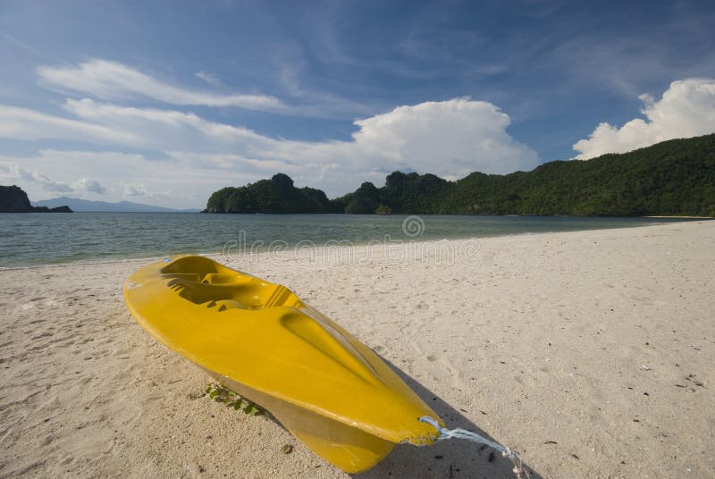 Yellow kayak stock image. Image of clear, colorful, ocean - 7451177
