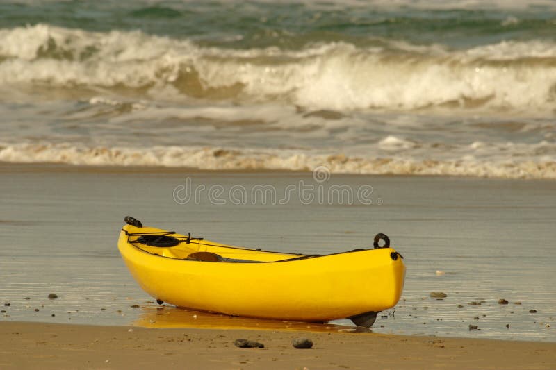 Yellow Kayak stock photo. Image of yellow, sand, water - 9845334