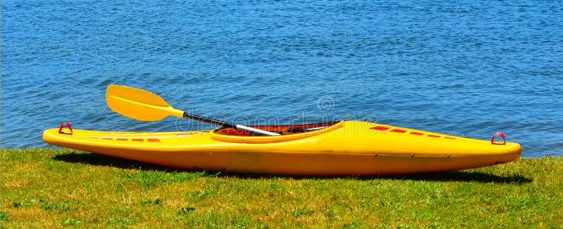 Yellow Kayak On The River stock photo. Image of hobbies - 4815538