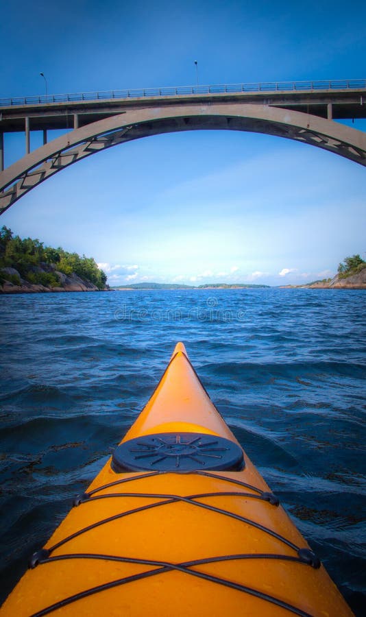 Yellow Kayak Towards Large Bridge Stock Photo - Image of paddle, rapid ...