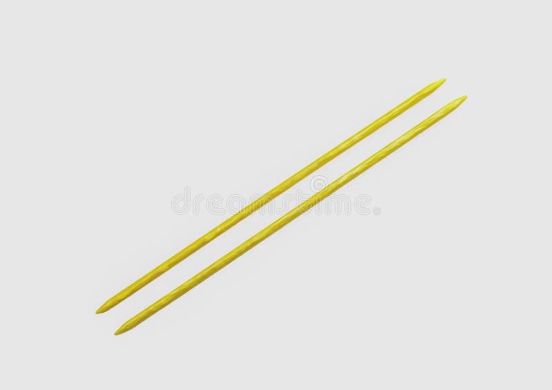 Yellow knitting needles stock photo. Image of plastic - 47545182