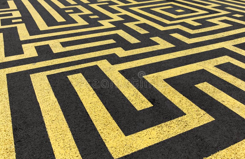Yellow Labyrinth Painted on a Black Asphalt Stock Image - Image of ...