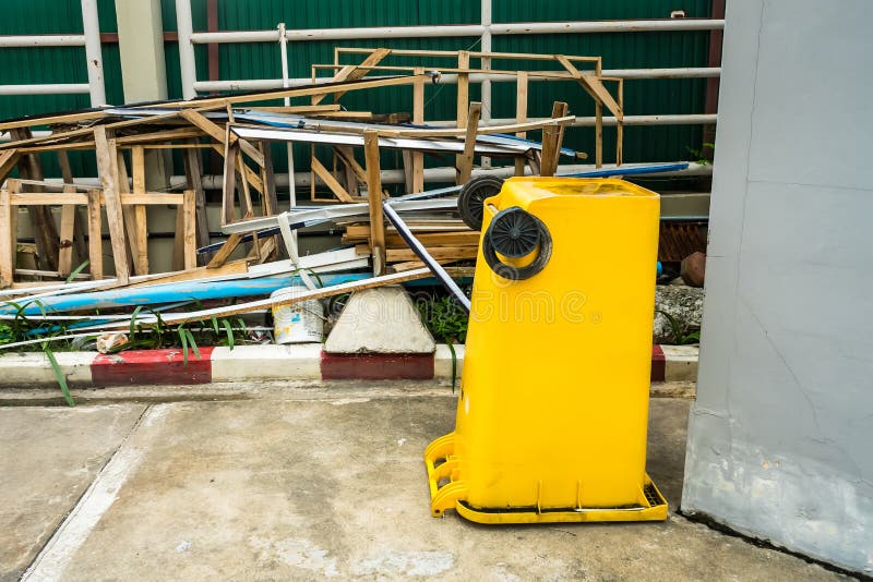 Yellow Large Trash Box on the Floor Stock Photo - Image of throw ...