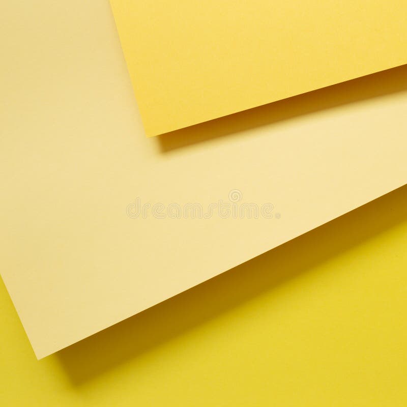 Yellow layered color paper stock photo. Image of layer - 211418080
