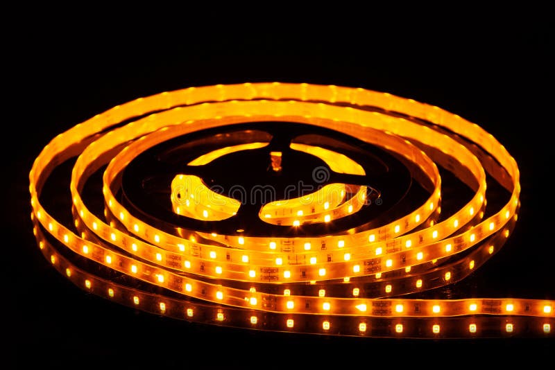 Yellow LED Strip on Reel with Black Background Stock Photo - Image of ...