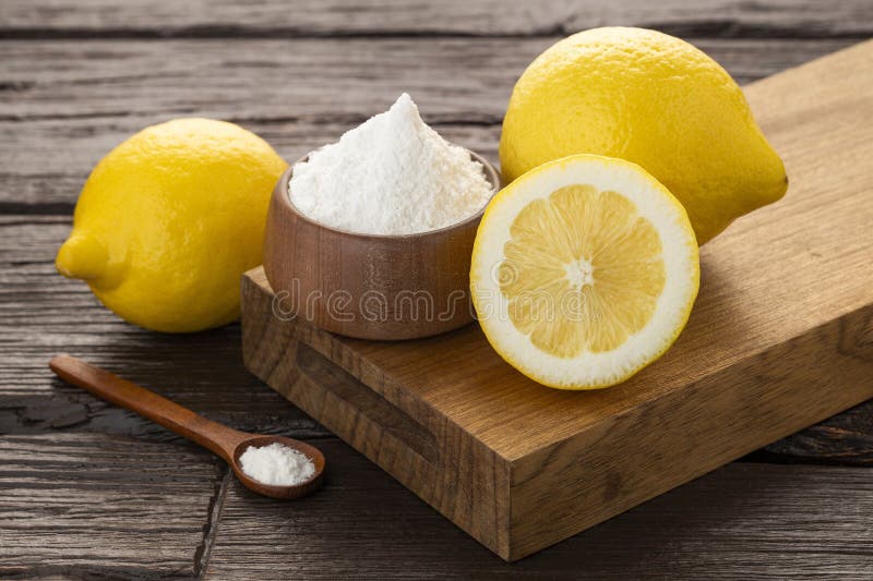 Yellow Lemon Fruit with Baking Soda in a Bowl and Spoon - Citrus Limon ...