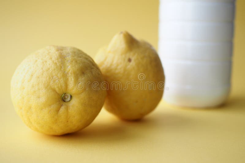 Yellow Lemon and Milk Jar on Table Stock Image - Image of liquid ...